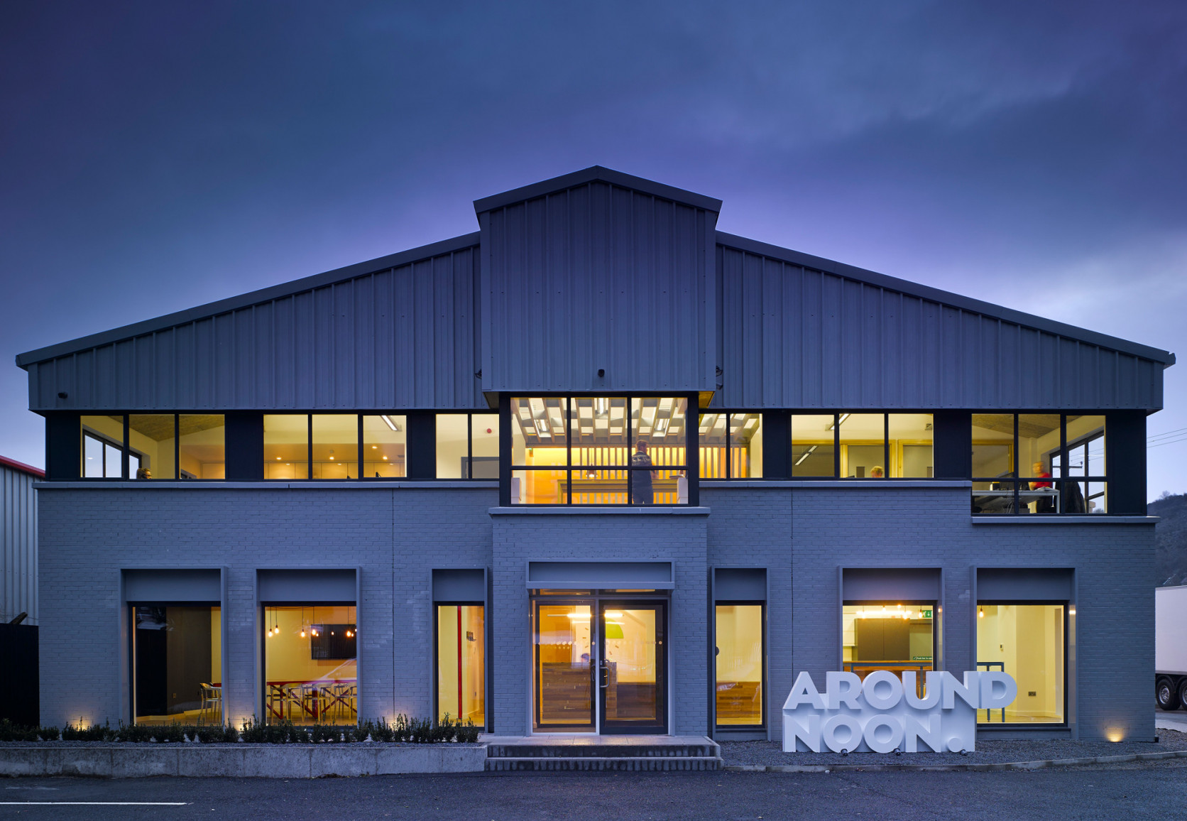 Around Noon Identity and Signage – 100 Archive